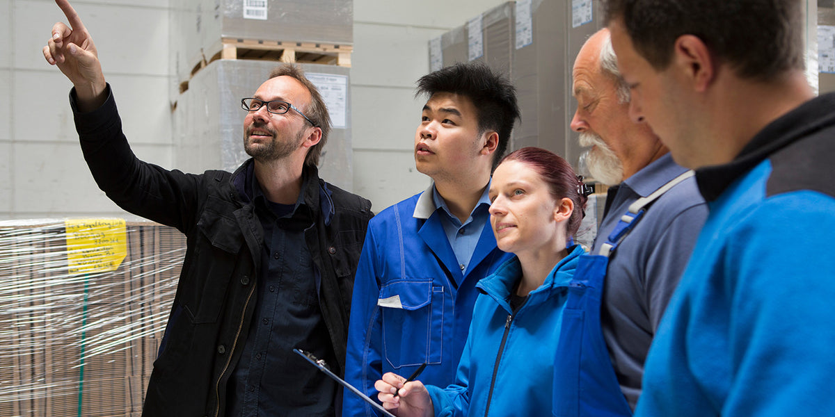 Tour Guide Systems for Effective Communication with Groups Visiting Fa